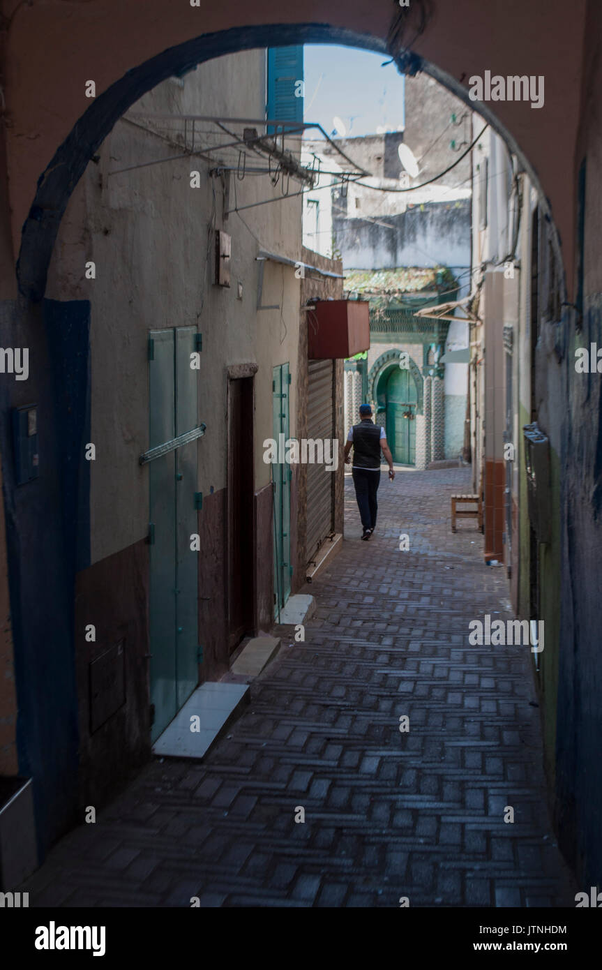 Morocco: people in the narrow alleys of Tangier, city on the Maghreb ...