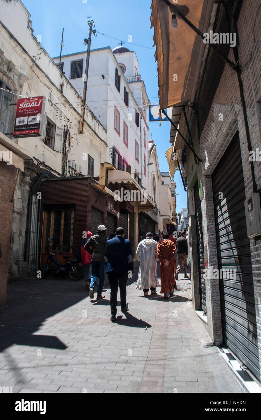 Morocco: people in the narrow alleys of Tangier, city on the Maghreb ...