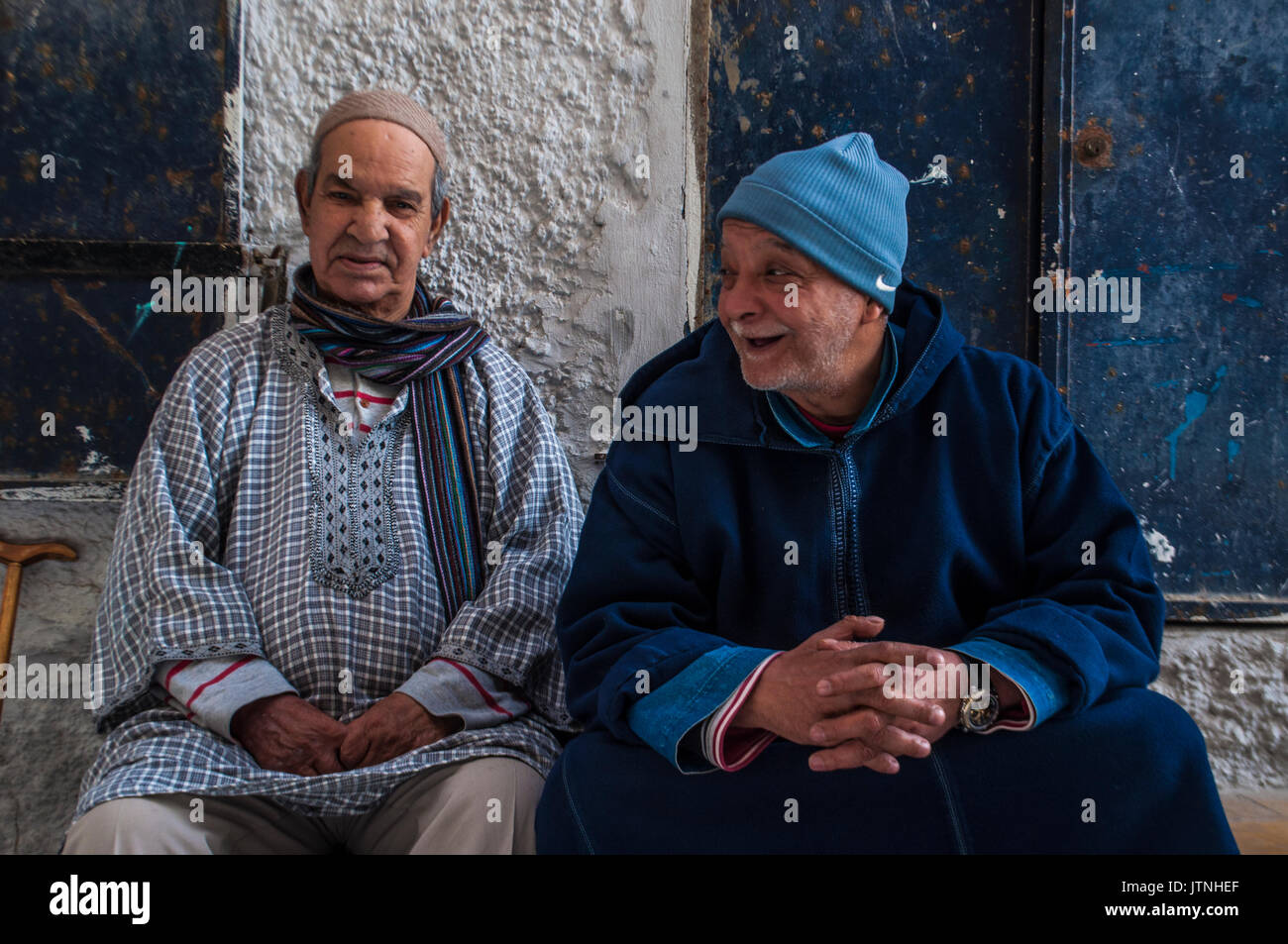 Morocco, Africa: old muslim men seated in the narrow alleys of Tangier ...