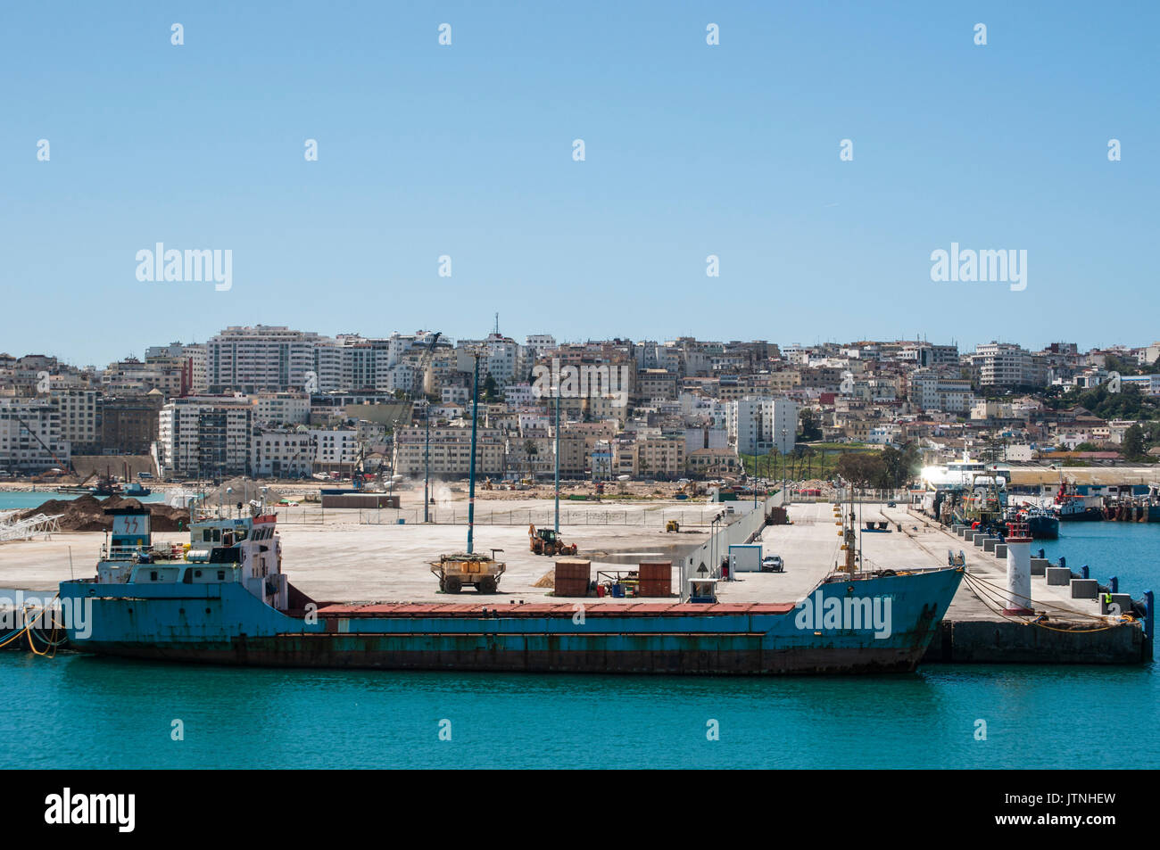 Ship in the port of Tangier, city on the Maghreb coast at western ...