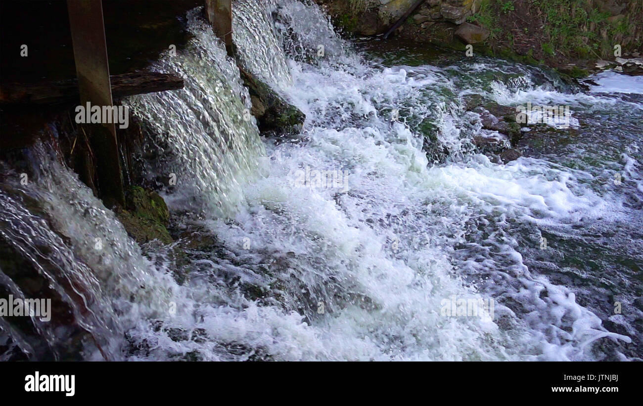 Artificial dam waterfall Stock Photo - Alamy