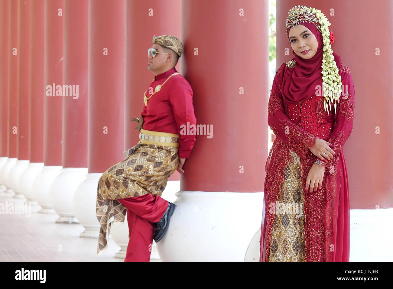 Traditional javanese wedding couple bride and bridegroom at garden ...