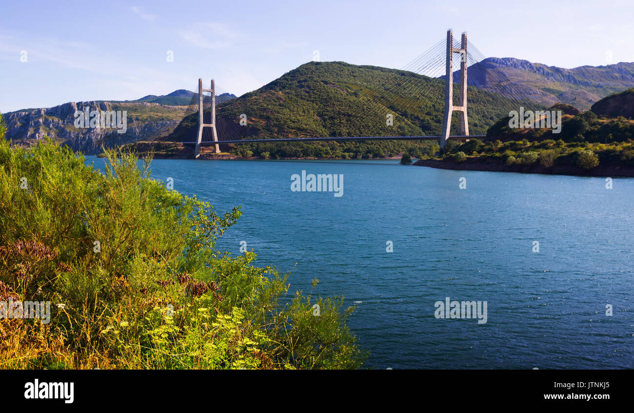 Cable-stayed bridge over reservoir of Barrios de Luna in mountains ...