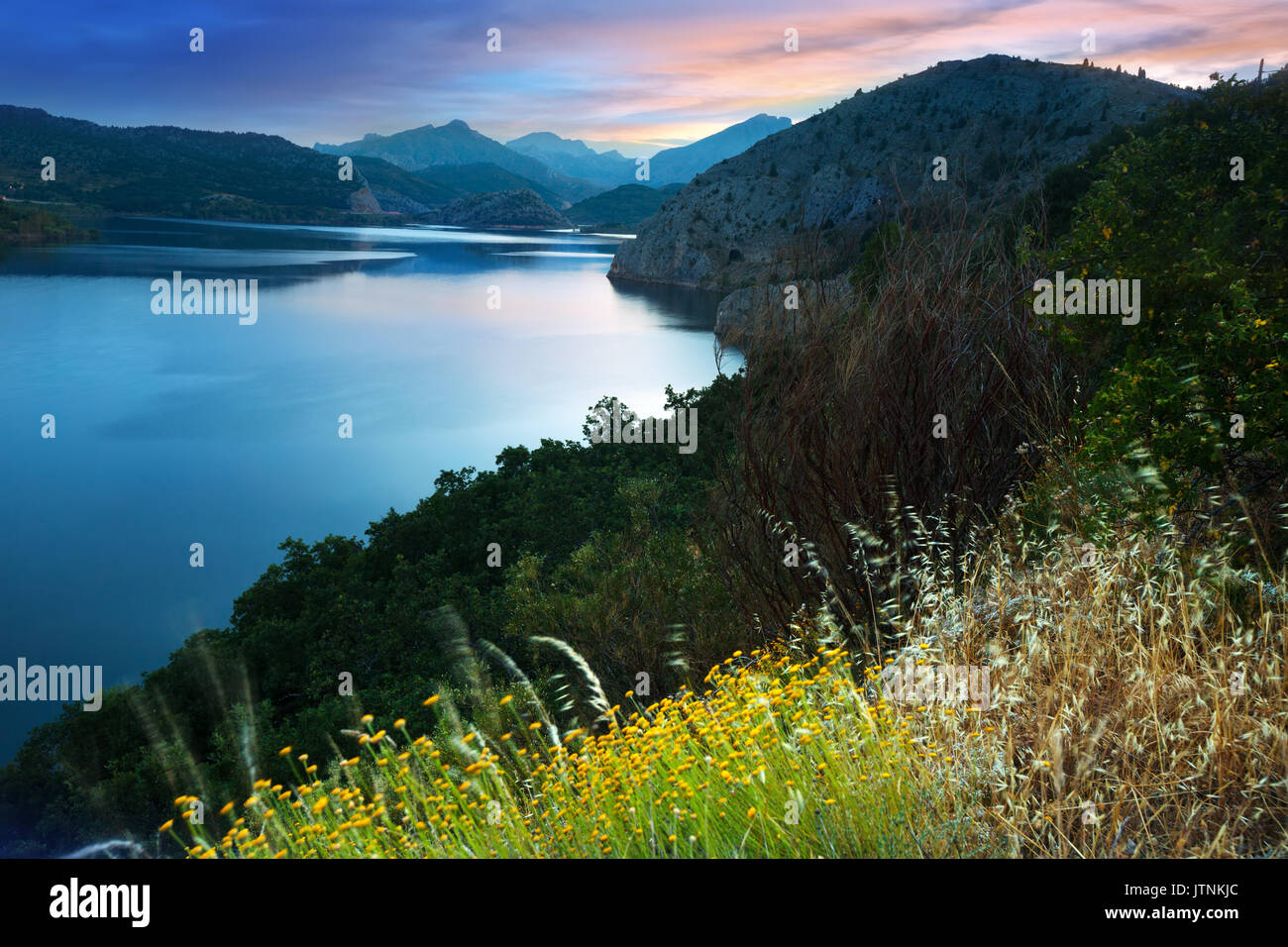 Mountain lake in summer twilight leon hi-res stock photography and ...