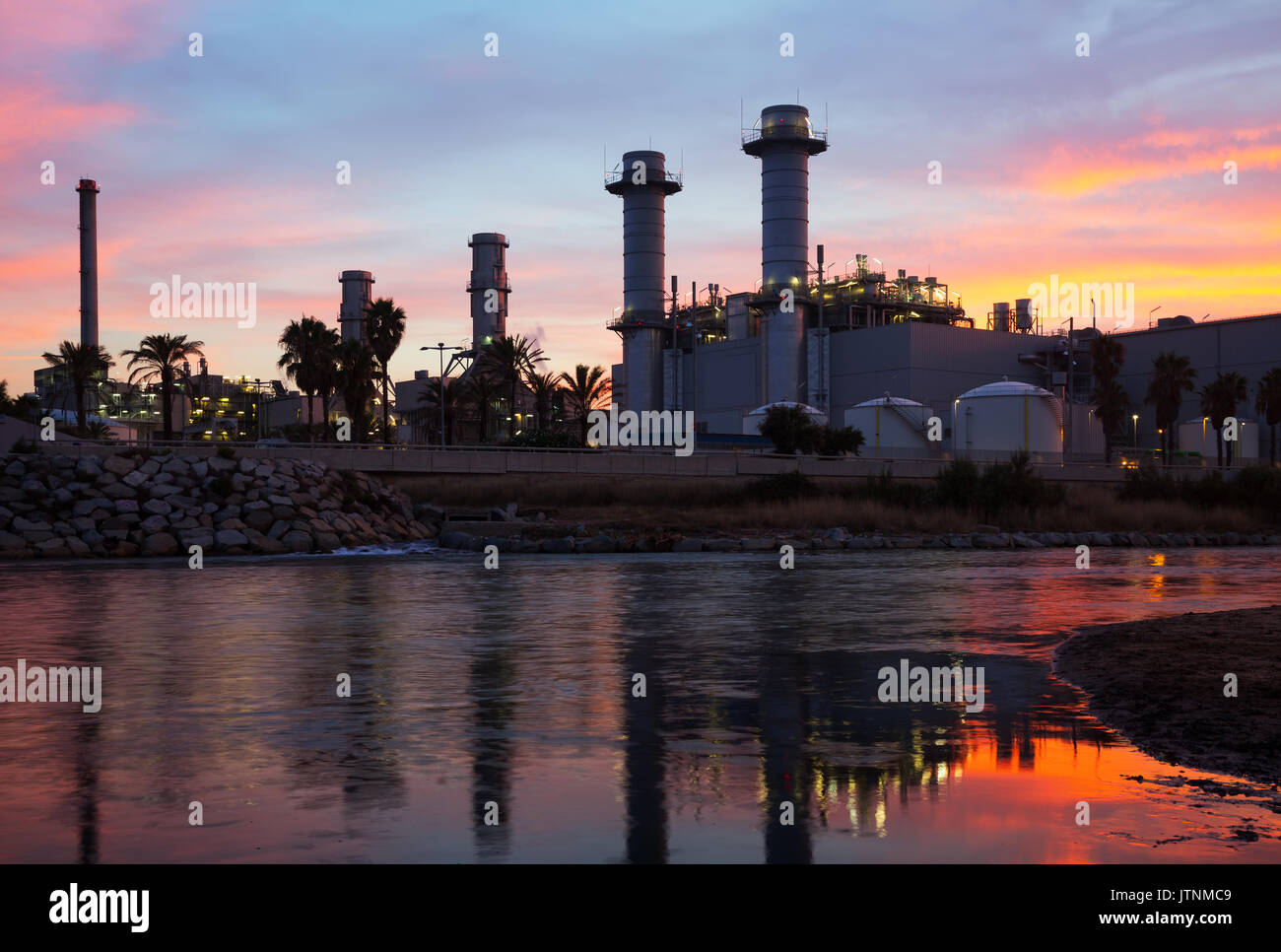 sunset view of power plant Stock Photo - Alamy