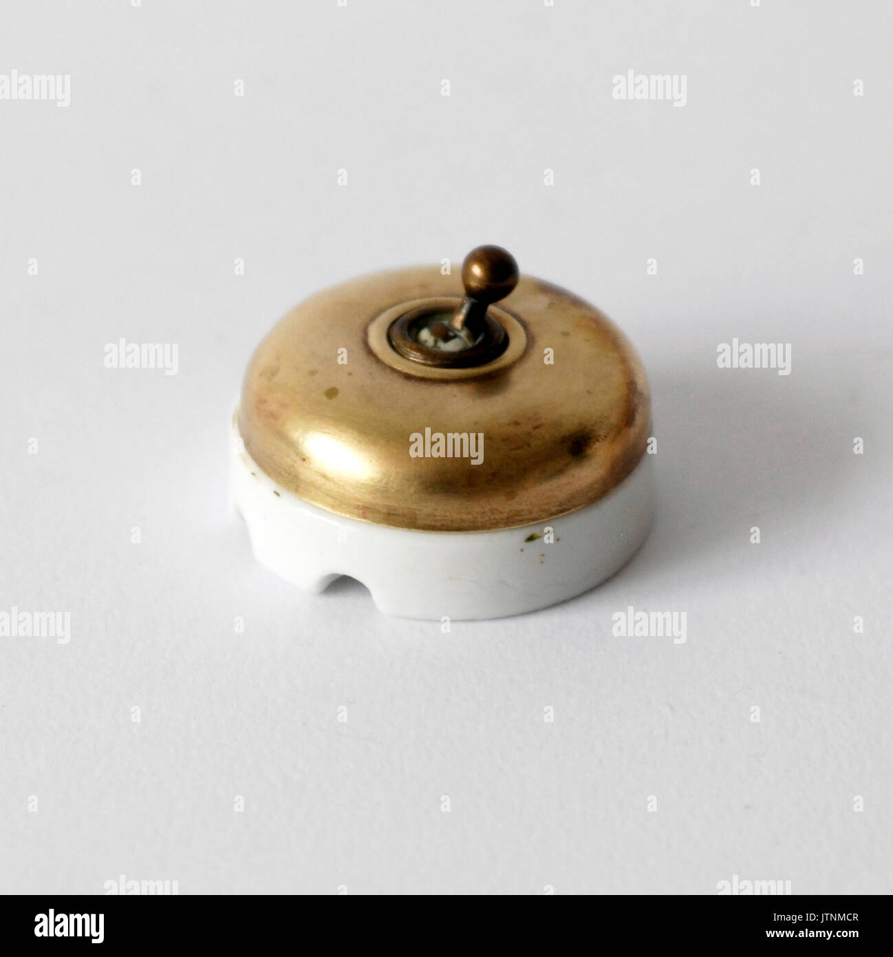 Vintage switch for electricity made by brass and porcelain Stock Photo ...