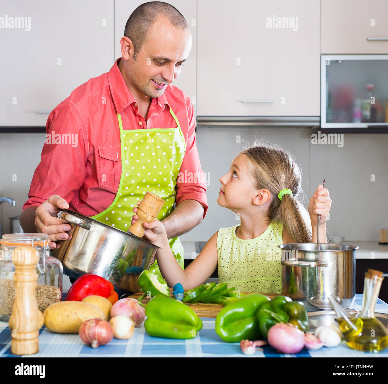 Family eating together middle class hi-res stock photography and images ...