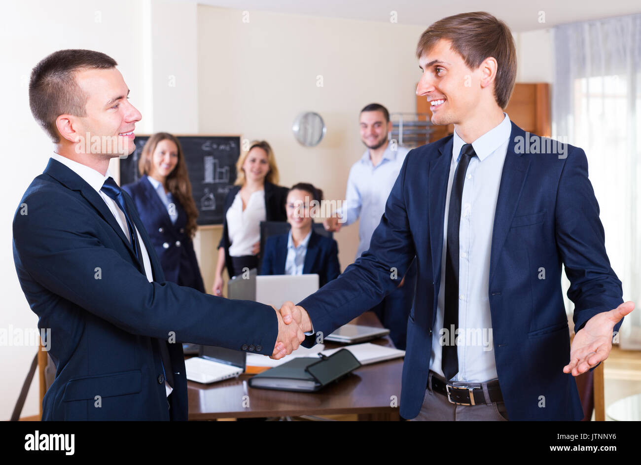 Firm handshake two men hi-res stock photography and images - Alamy
