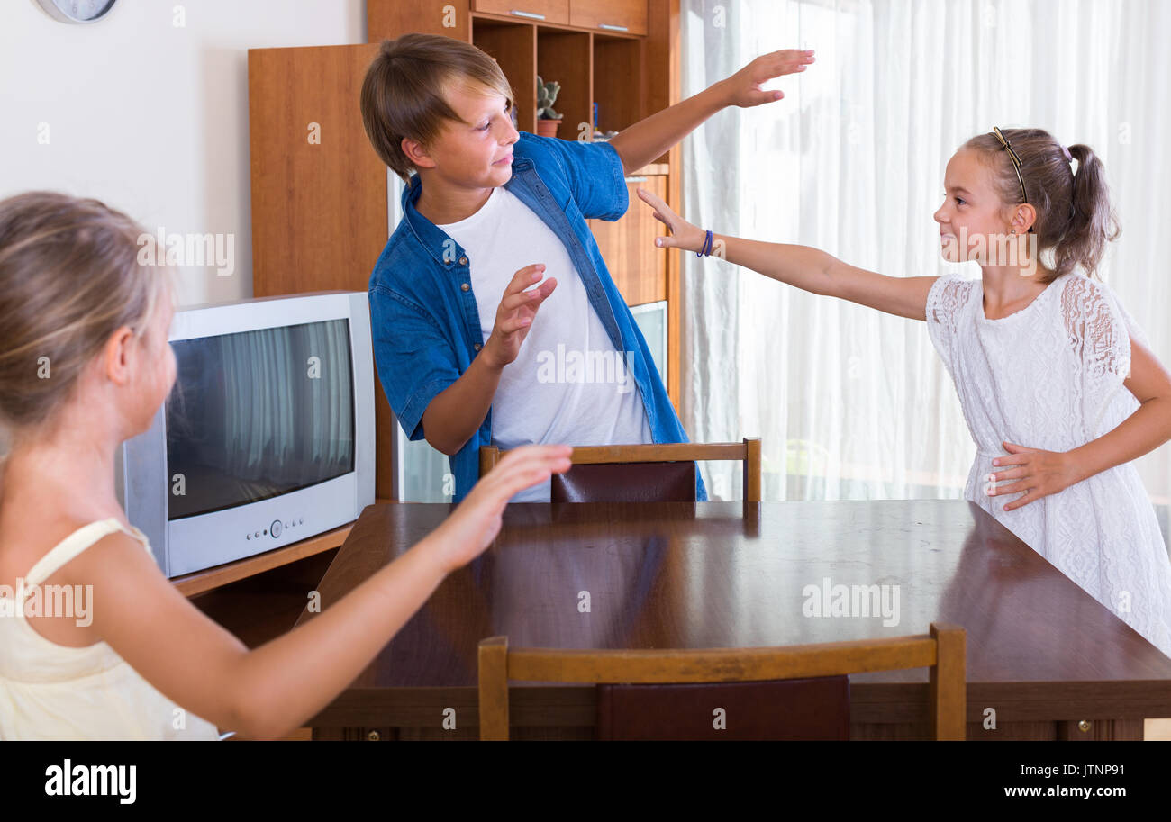Happy children playing romp game Touch-last at home Stock Photo - Alamy