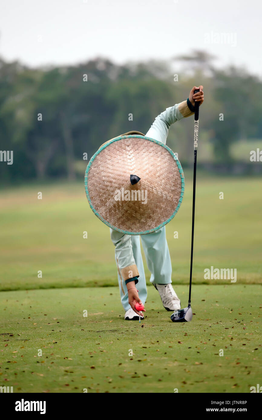 Asian golf caddie hi-res stock photography and images - Alamy
