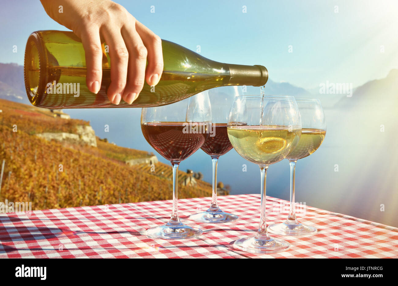 Hand pouring wine couple hi-res stock photography and images - Alamy