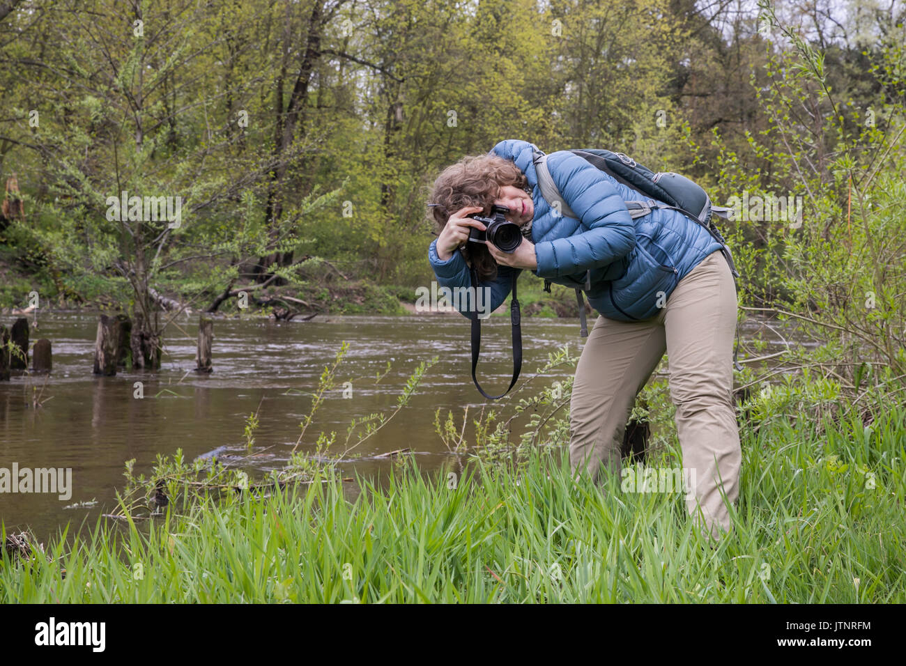 Kneeling to take photo photos hi-res stock photography and images - Alamy