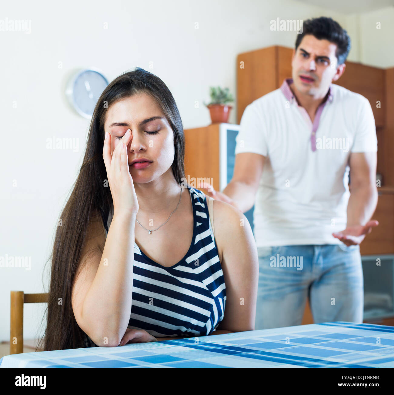 Angry young spouses having domestic argue at living room in home Stock ...