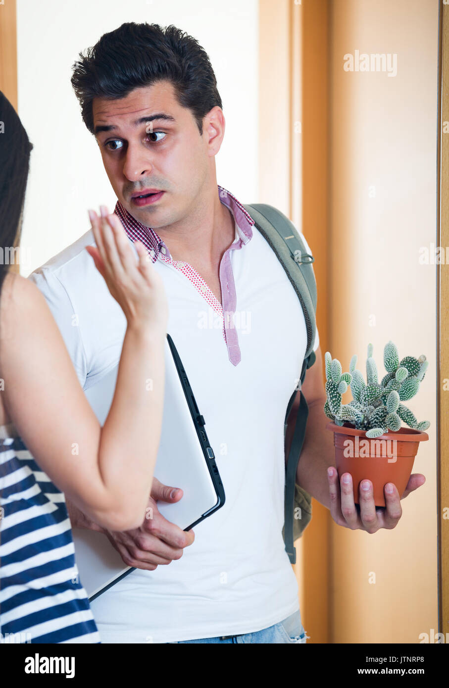 Woman angry guy watching hi-res stock photography and images - Alamy