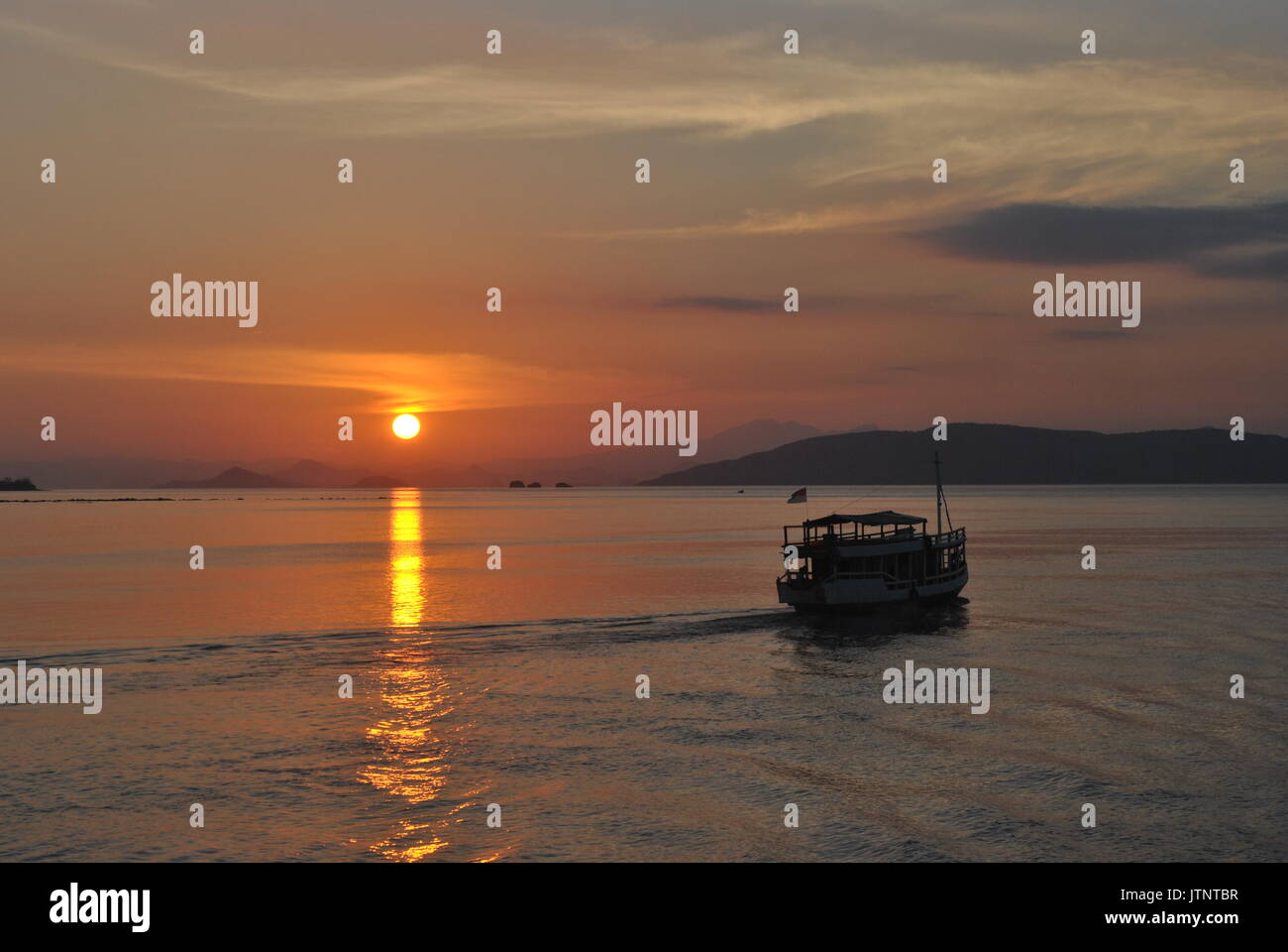 The boat and sundown view Stock Photo - Alamy