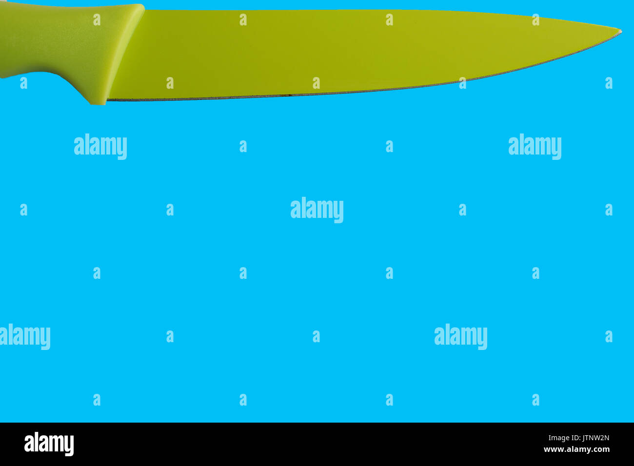 green isolated knife with blue background Stock Photo - Alamy