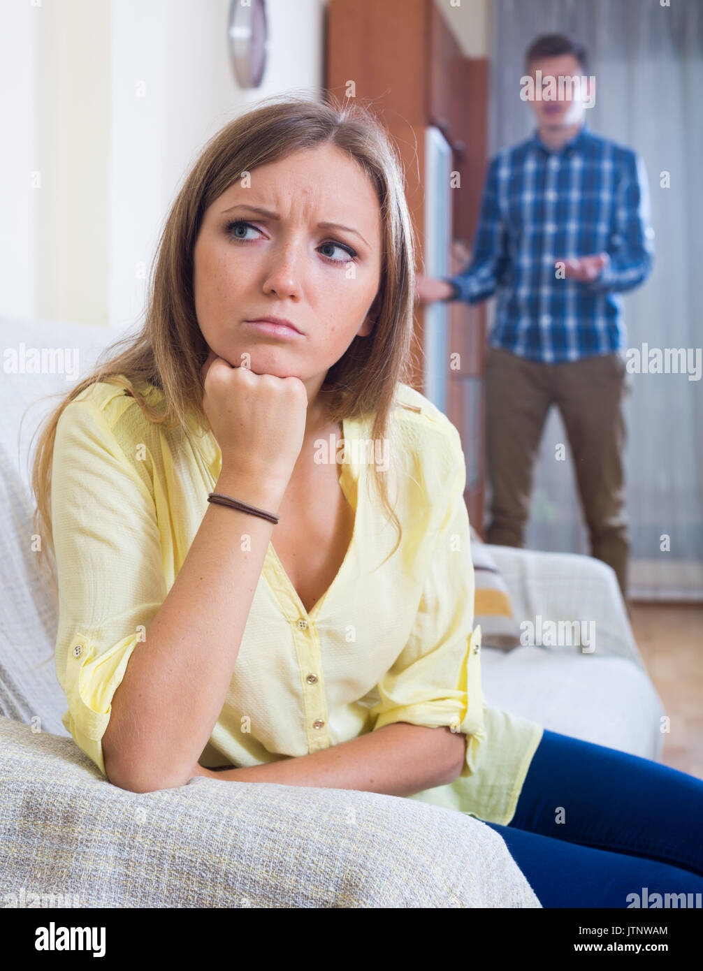 Upset man and frustrated girl having bad argument indoors Stock Photo ...