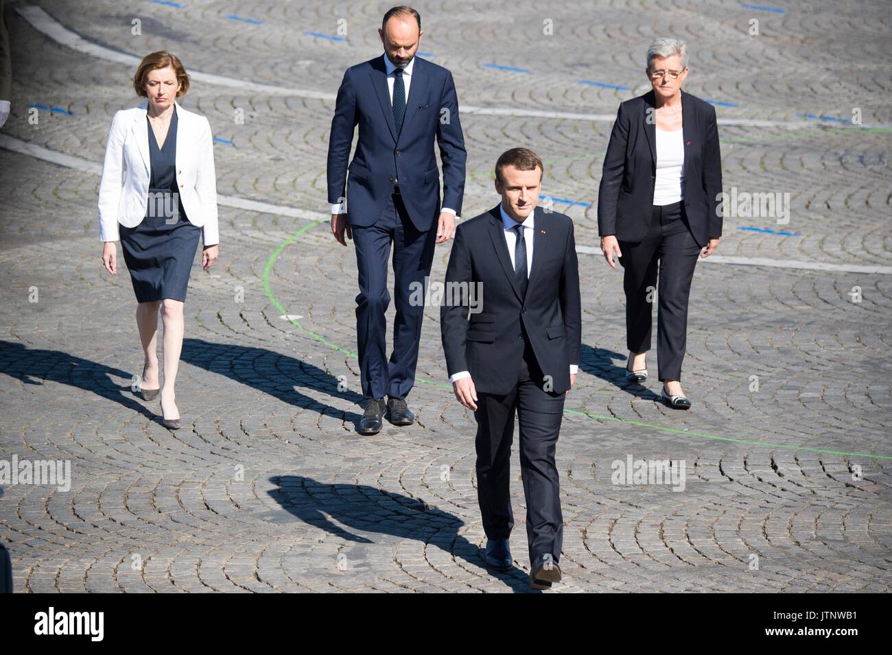 French President Emmanuel Macron walks to the review stand before the ...