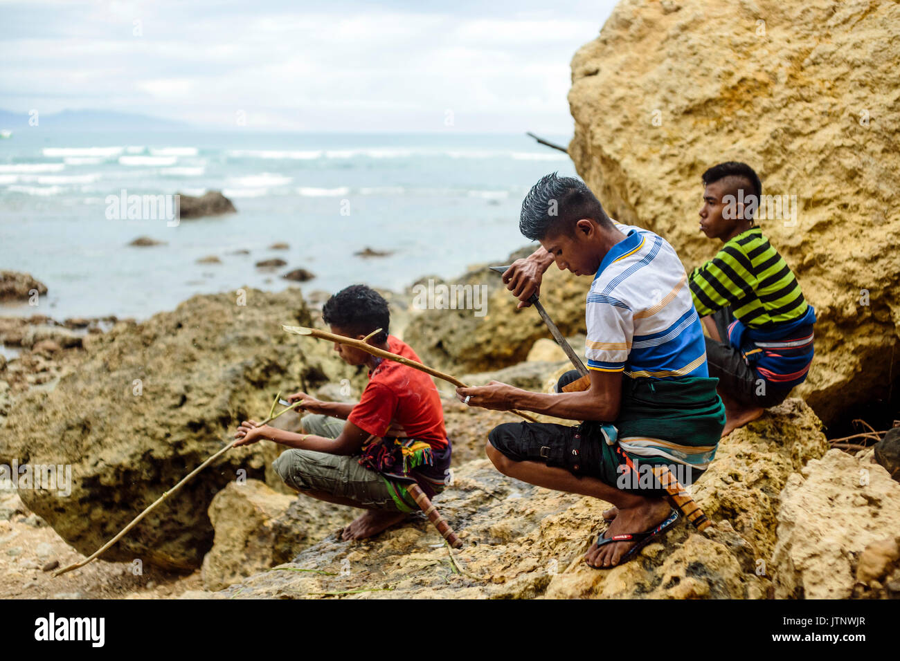 People gathering at the beach before Pasola festival, Sumba Island ...