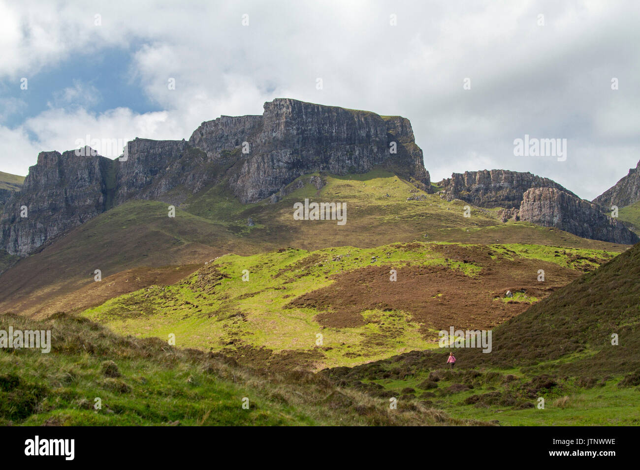 Rugged landscape on Isle of Skye, Scotland, with tiny hiker dwarf by ...