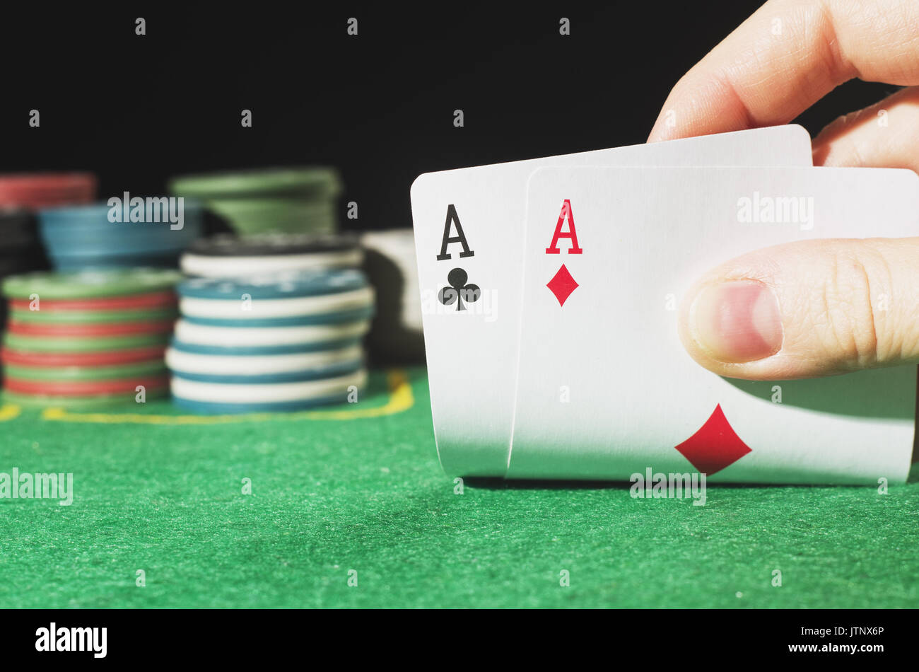 Poker hand holding aces hi-res stock photography and images - Alamy