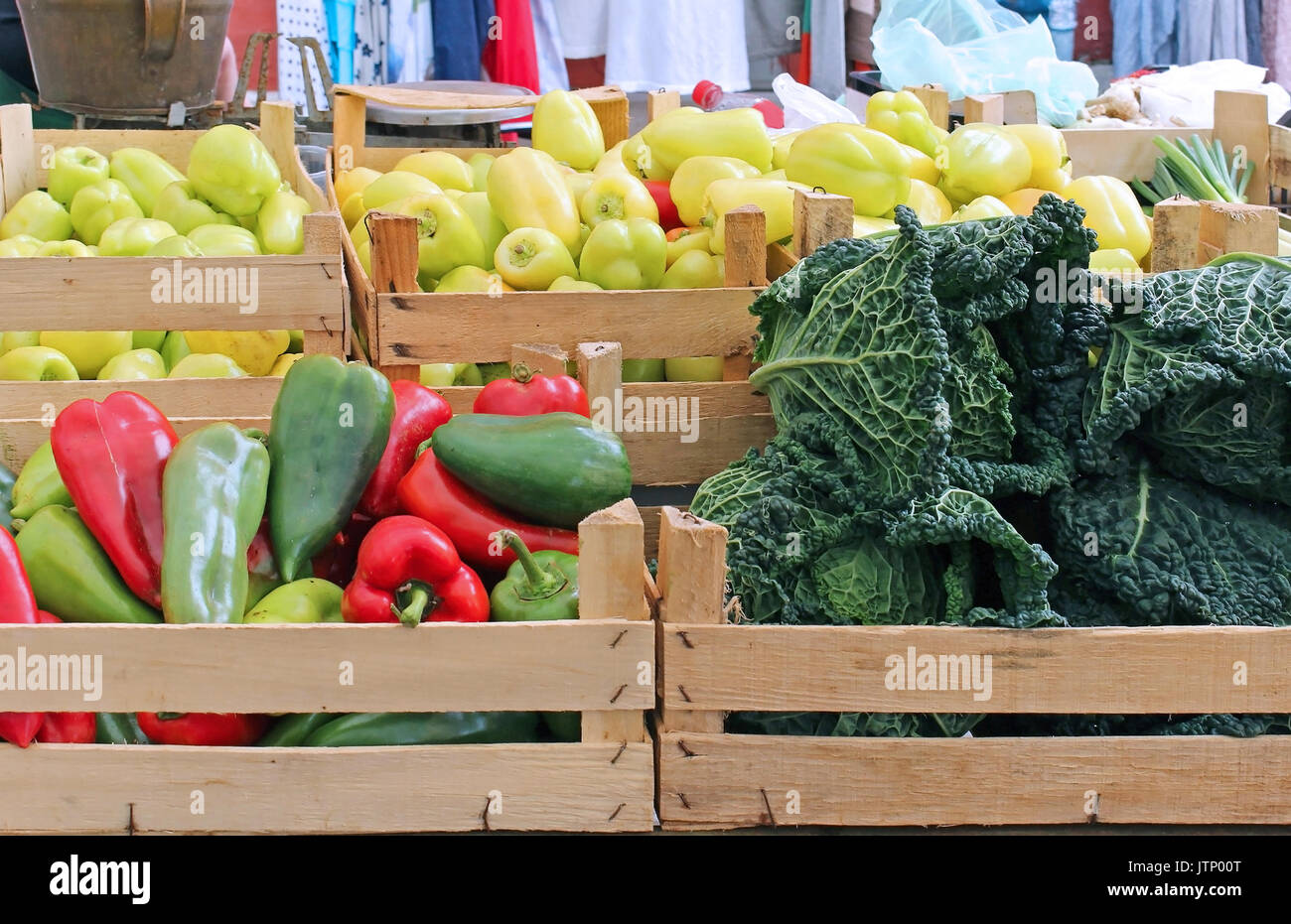 Fresh organic vegetables in wooden crates on market stall Stock Photo ...