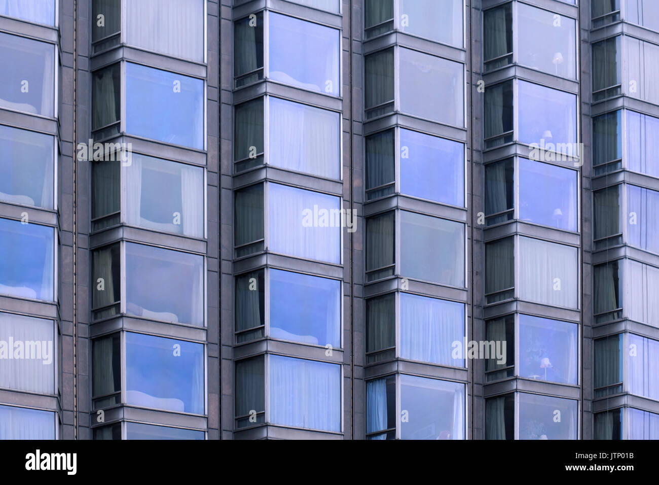 Abstract pattern of glass windows building facade Stock Photo - Alamy