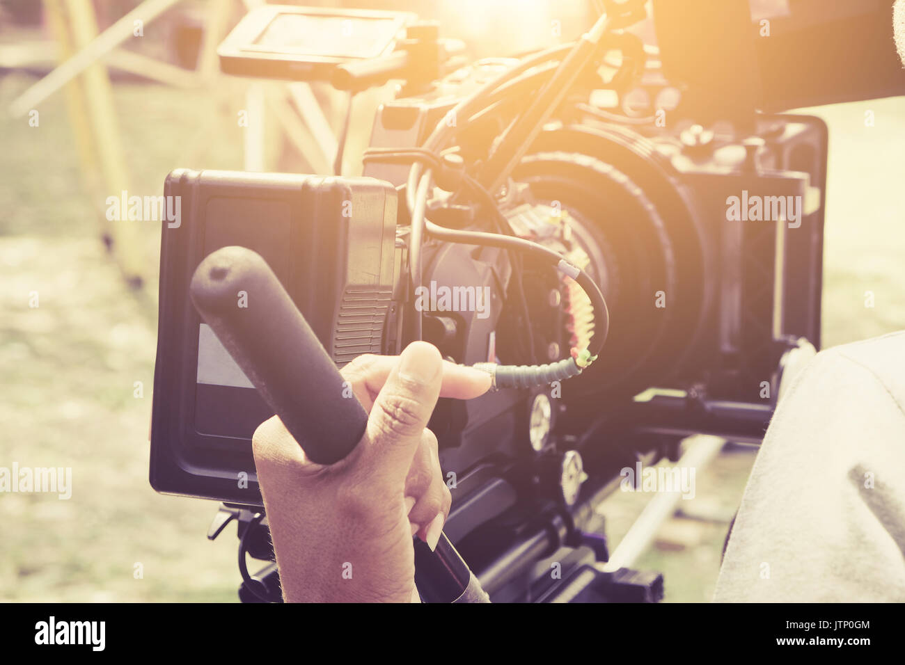 Cameraman with his video camera shooting, Hands Adjusting Camera,film ...