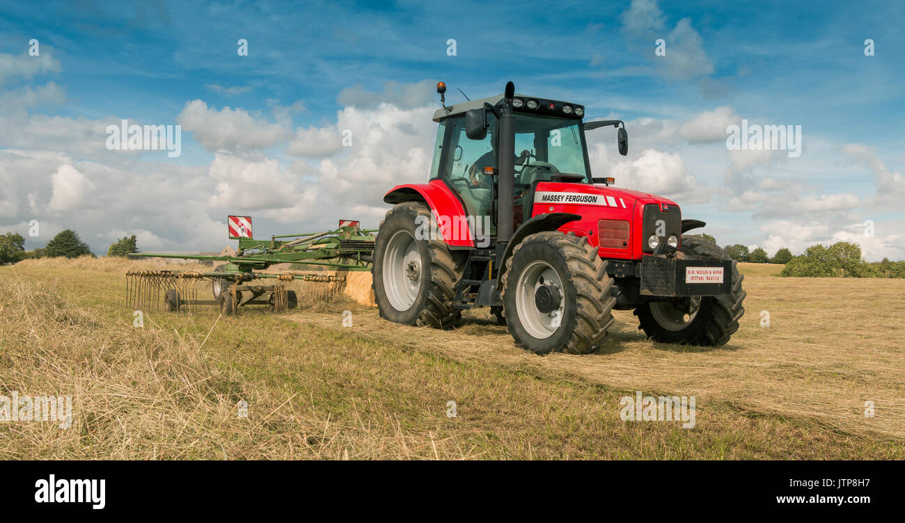 UK Farming - Tractor and Hay Rake at Work August 2017 Stock Photo - Alamy