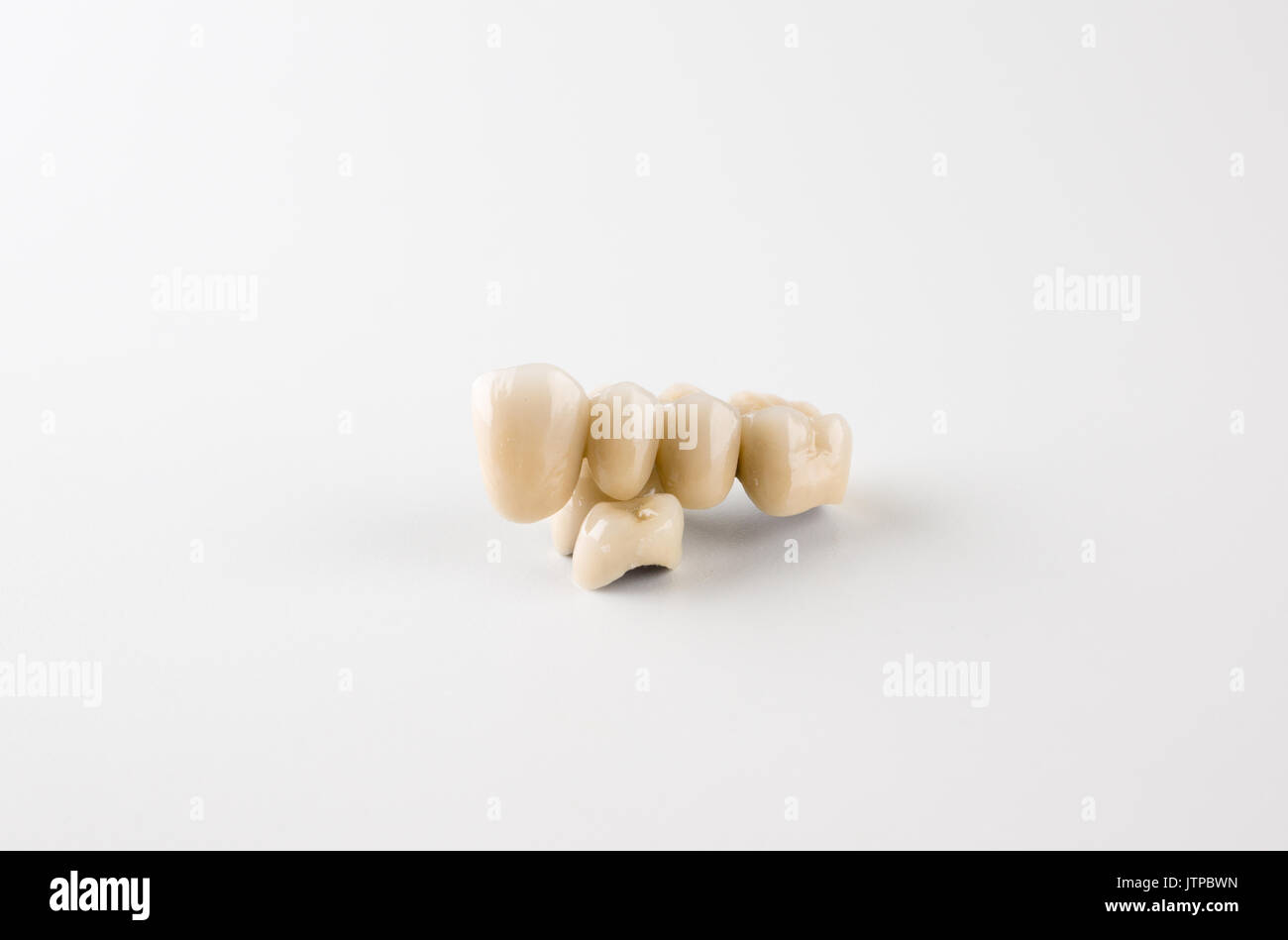 Artificial teeth are made of ceramics for the patient Stock Photo - Alamy
