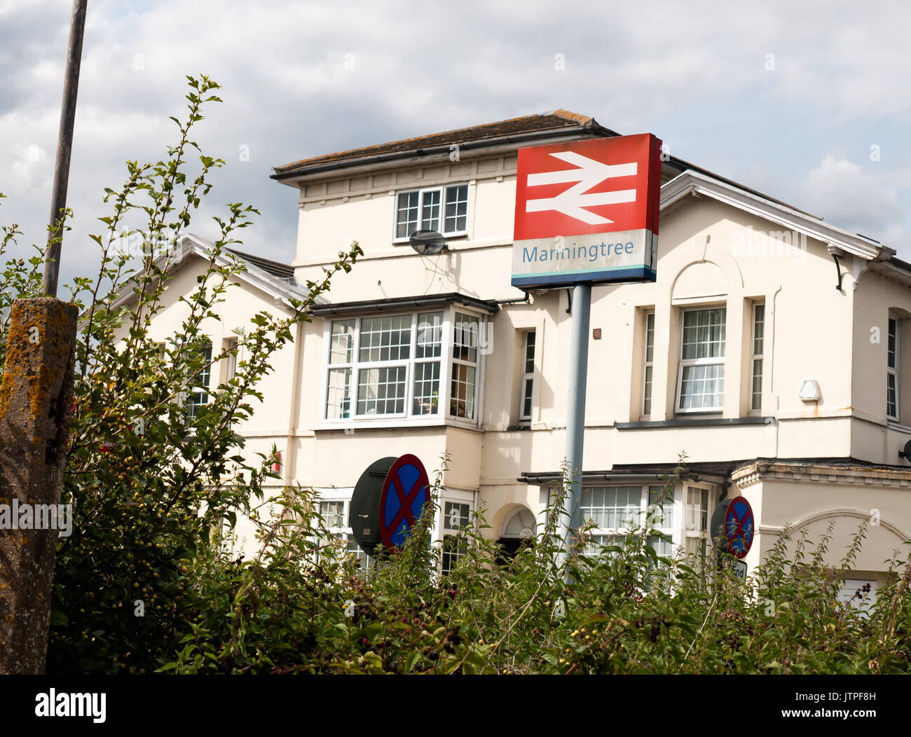 manningtree train station building from the outside white, station sign ...