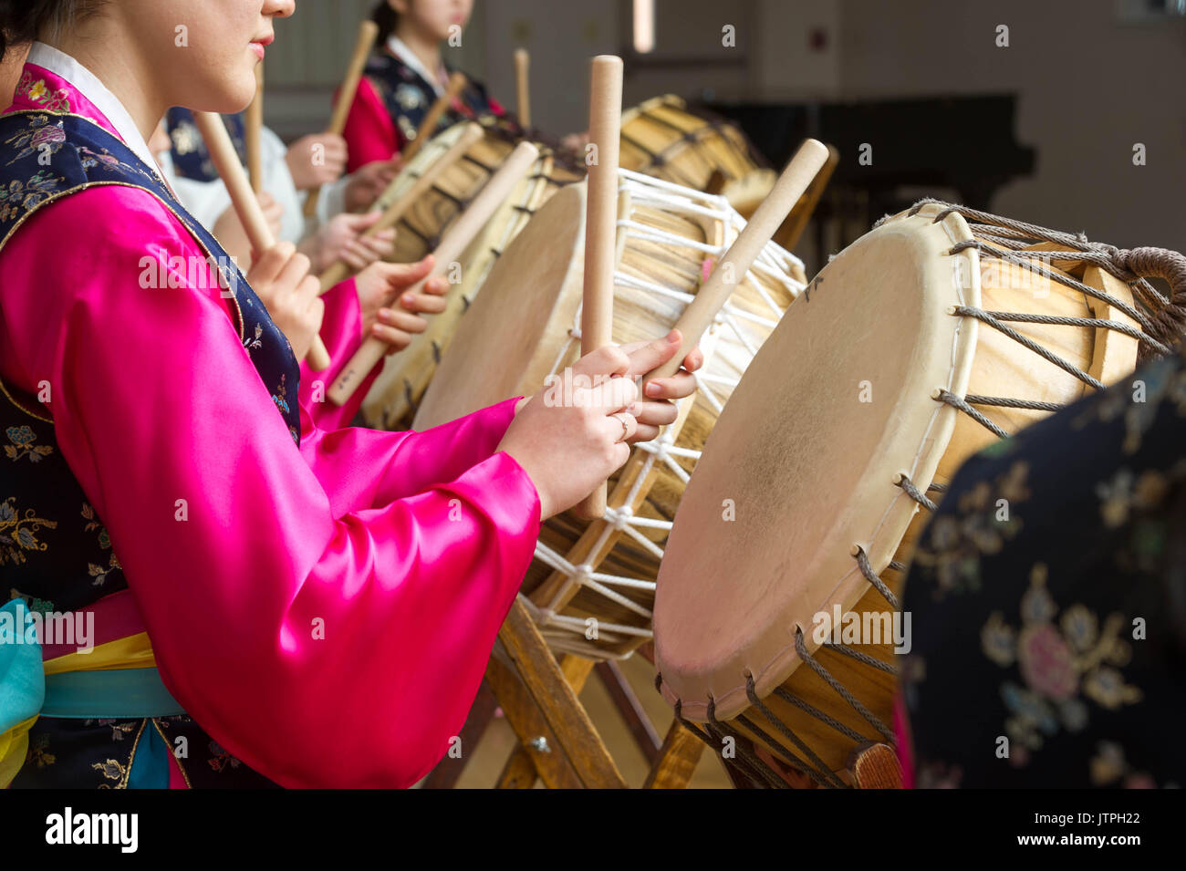 Traditional Korean drummers perform a rhythmic set on buk drums Stock ...