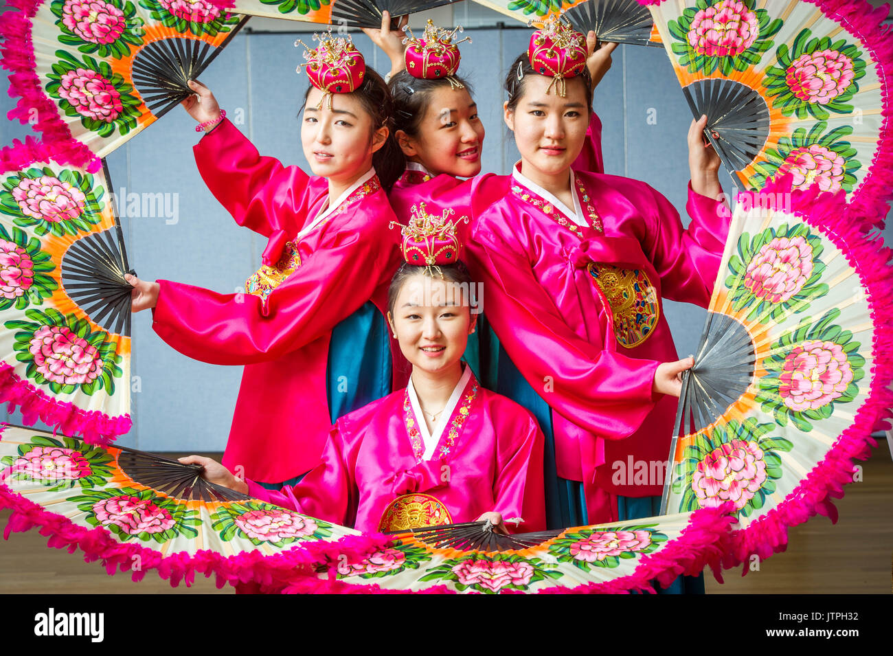 Female Korean dancers display giant fans during fan dance performance ...