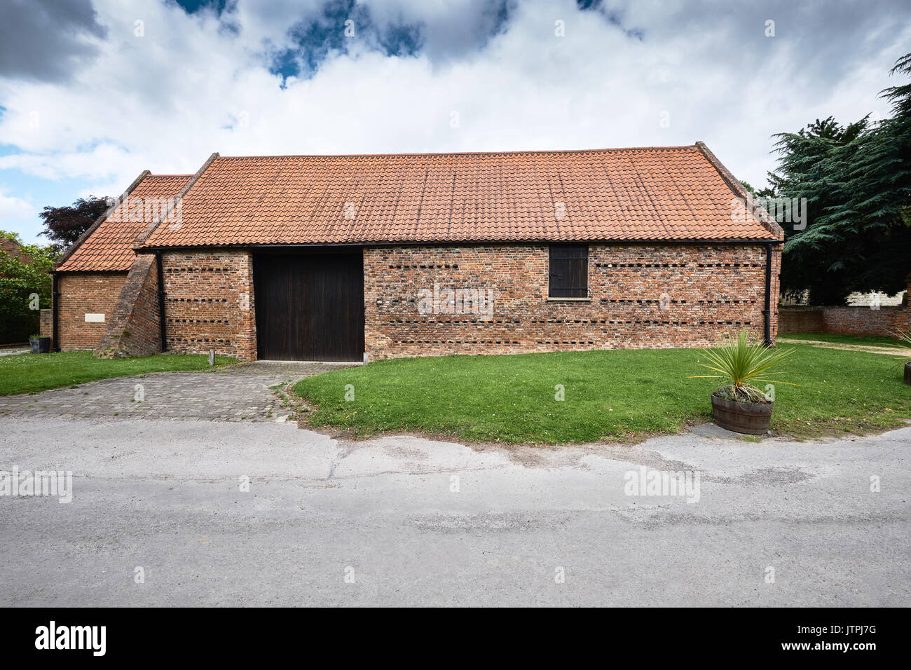 Exterior of poppleton tithe barn hi-res stock photography and images ...