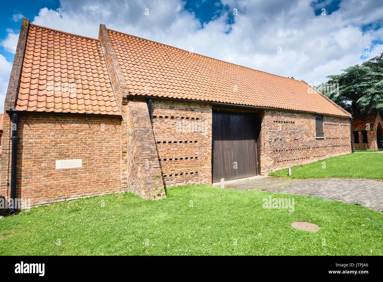 Exterior of poppleton tithe barn hi-res stock photography and images ...