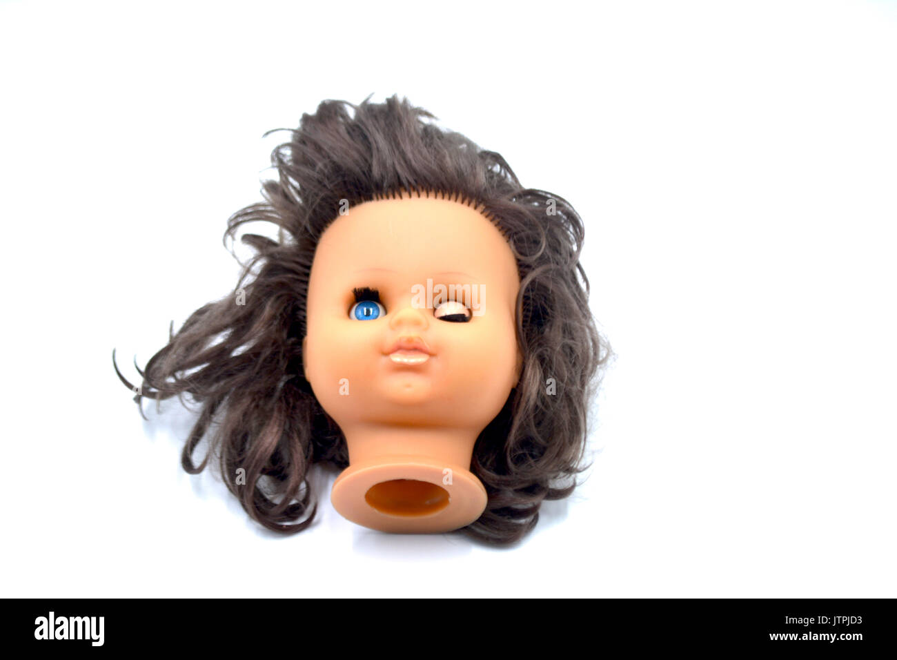 Doll head white background Stock Photo - Alamy