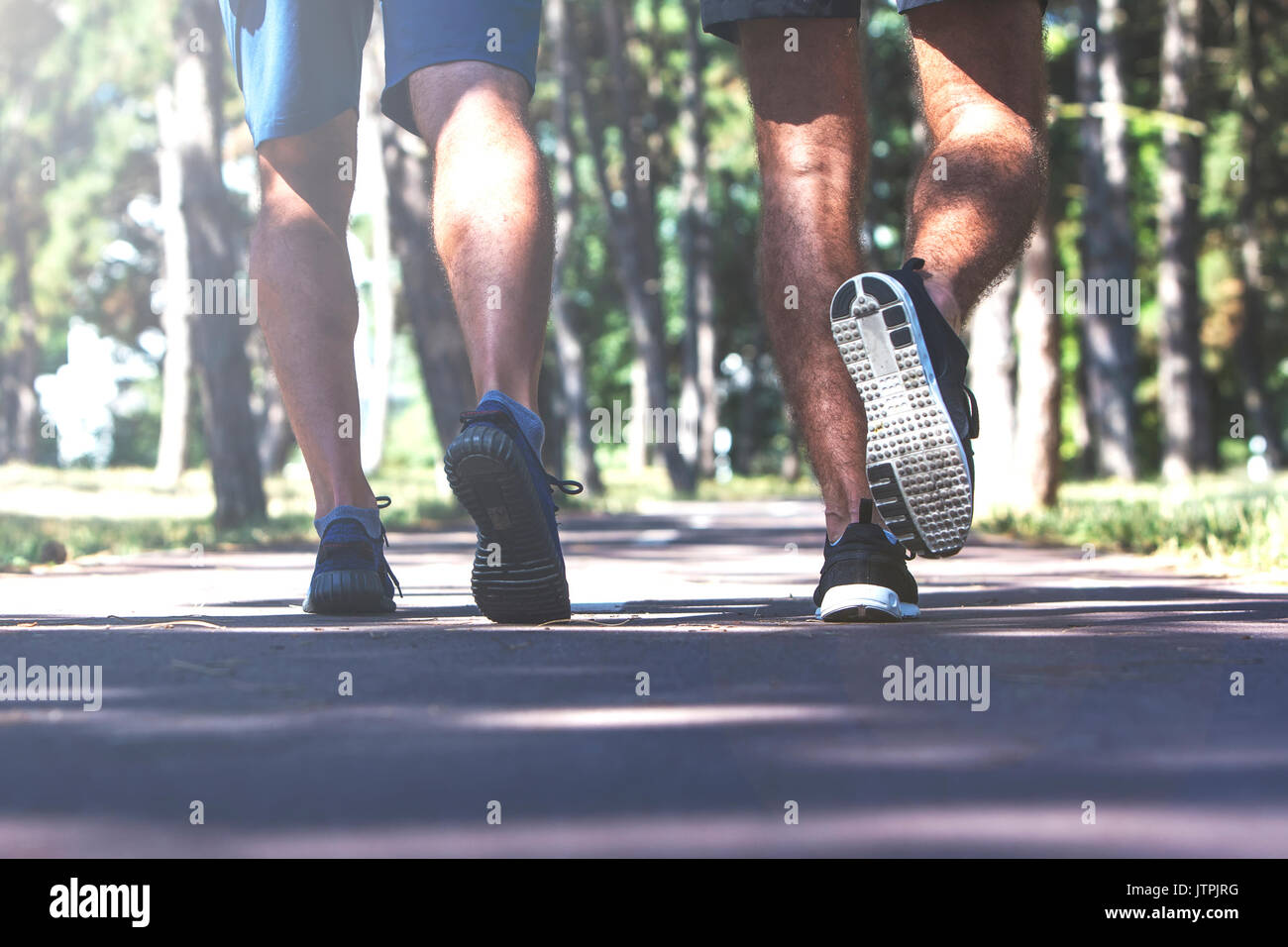 Happy men outside running hi-res stock photography and images - Alamy