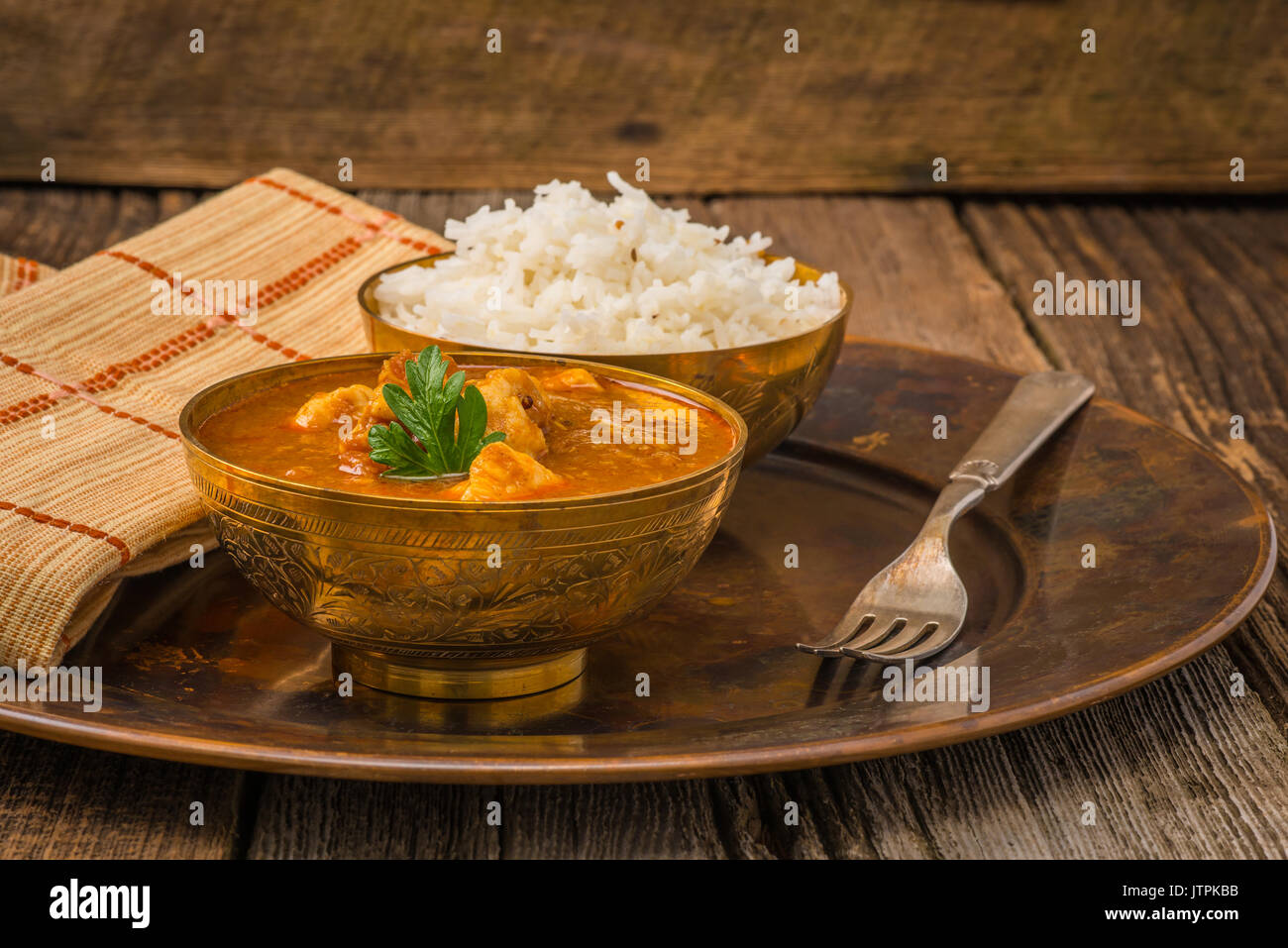 Indian chicken madras served with white basmati rice Stock Photo - Alamy