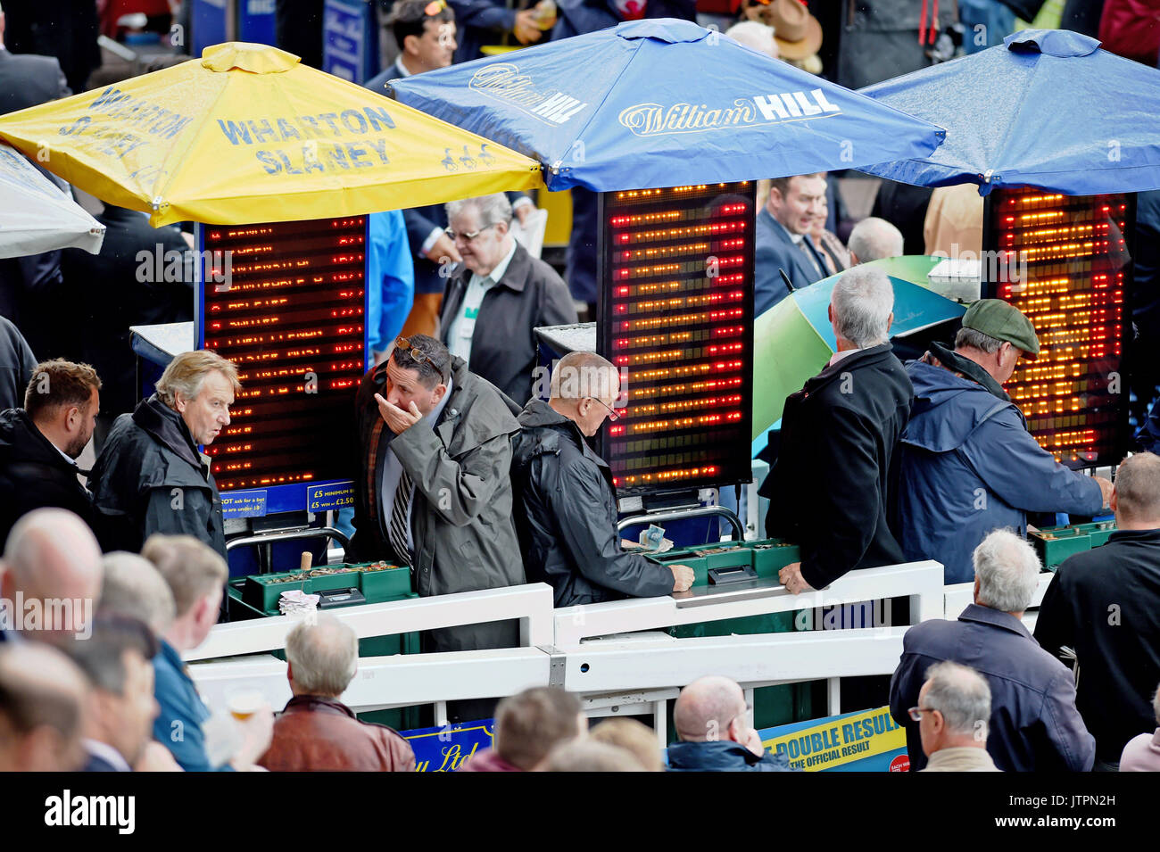 Bookmaker racecourse hi-res stock photography and images - Alamy