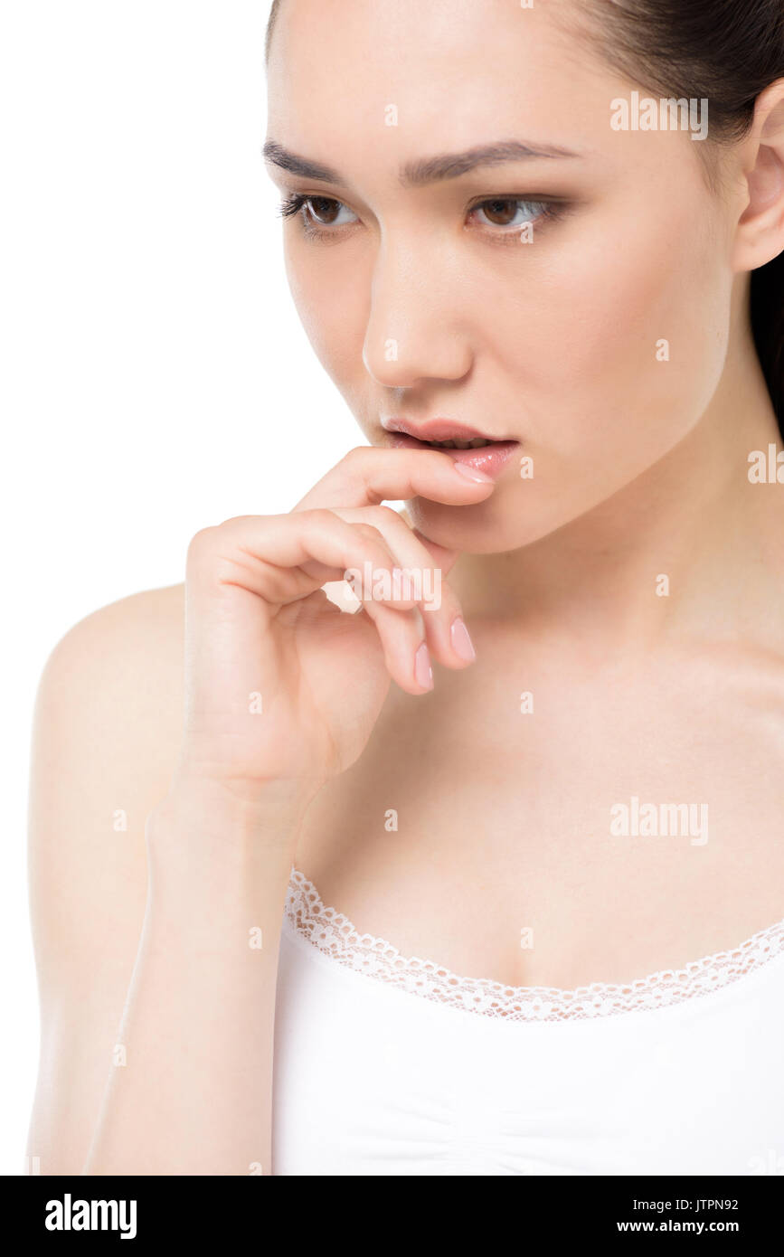 Portrait of sensual asian woman with hand on lip looking away Stock ...