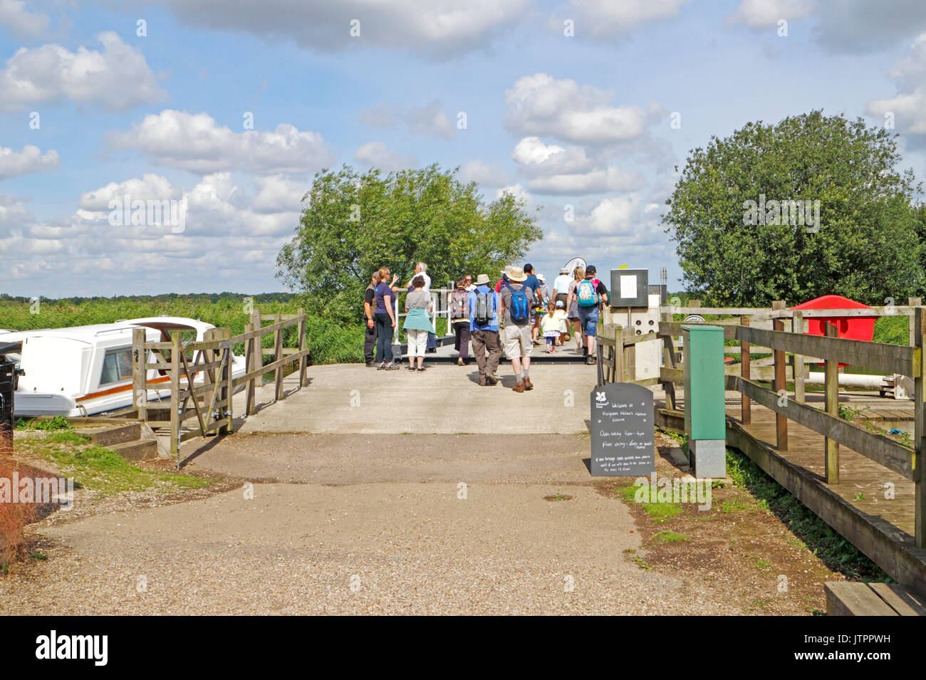 A swing bridge opened on the Norfolk Broads to allow public access to ...