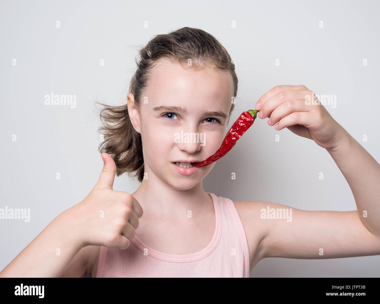 little girl with pepper Stock Photo - Alamy