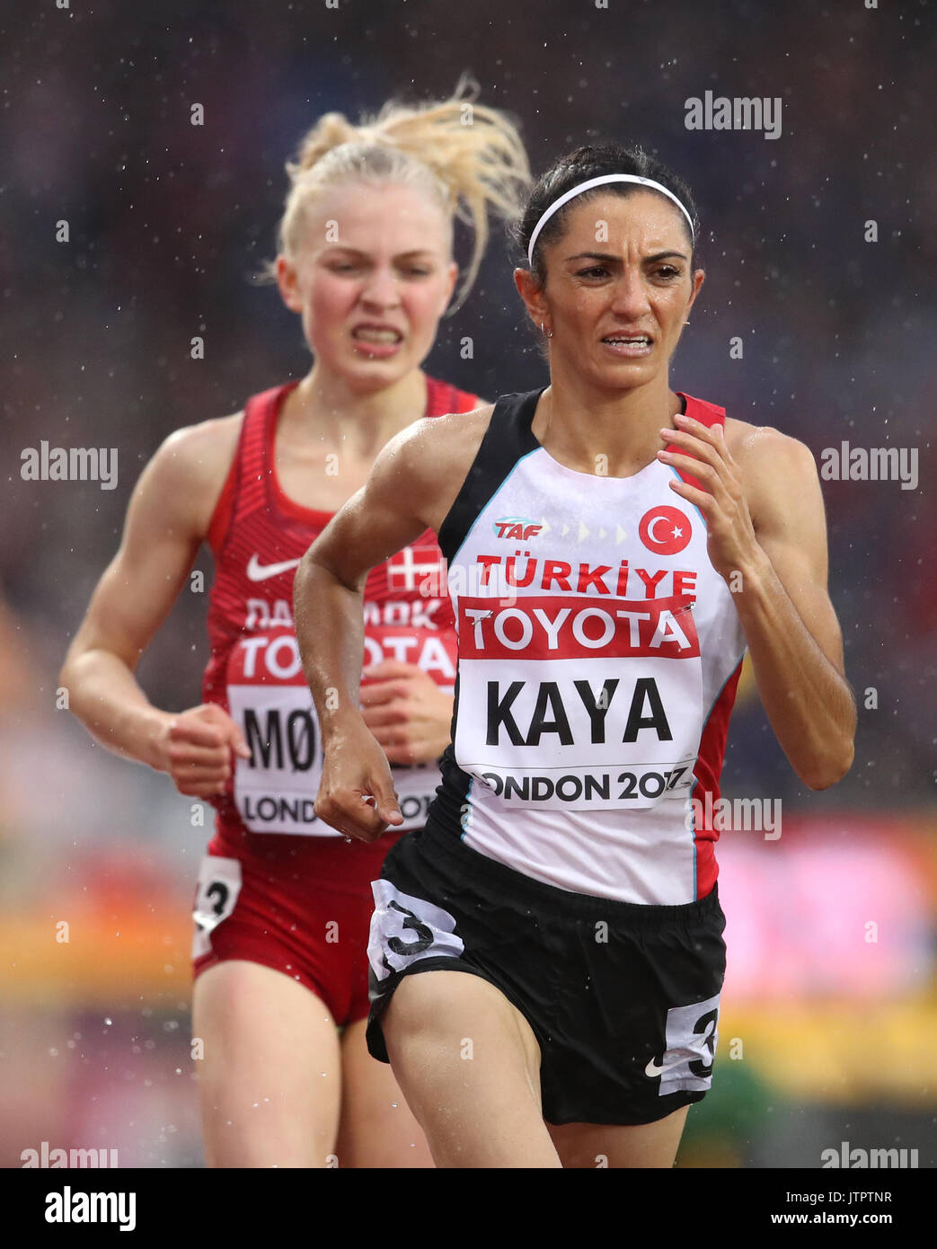 Turkey's Ozlem Kaya (right) in the Women's 3000m Steeplechase heat two during day six of the ...