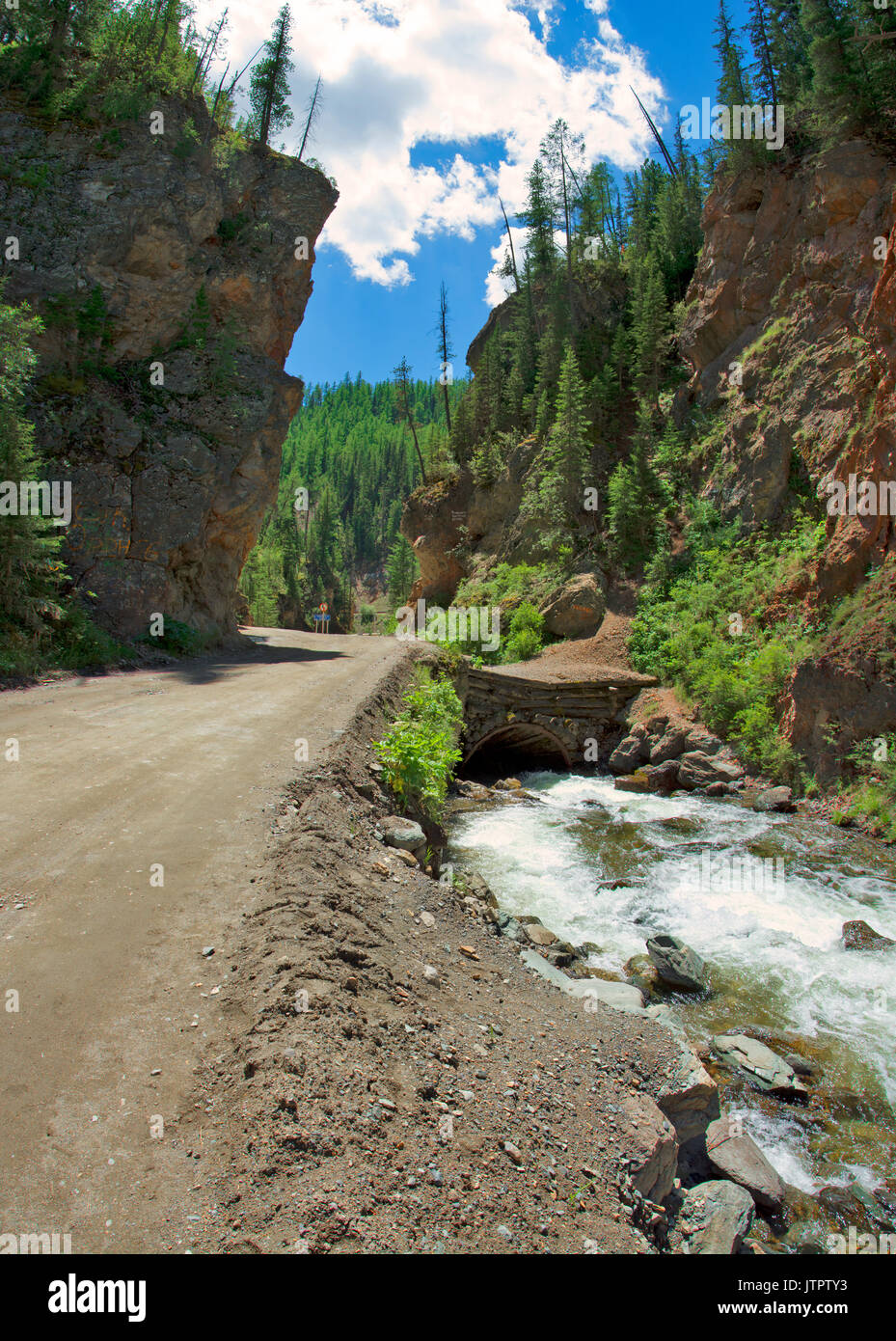 Red Gates pass. Altai mountains. River in the red rocks Stock Photo - Alamy