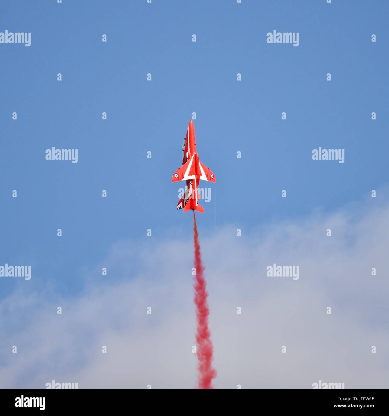 Red Arrows T1 Hawk in a vertical climb Stock Photo - Alamy