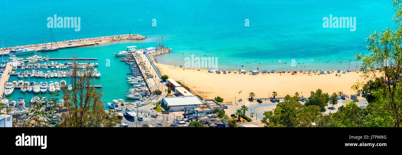 Panoramic view of waterfront with marina and beach in Sidi Bou Said ...