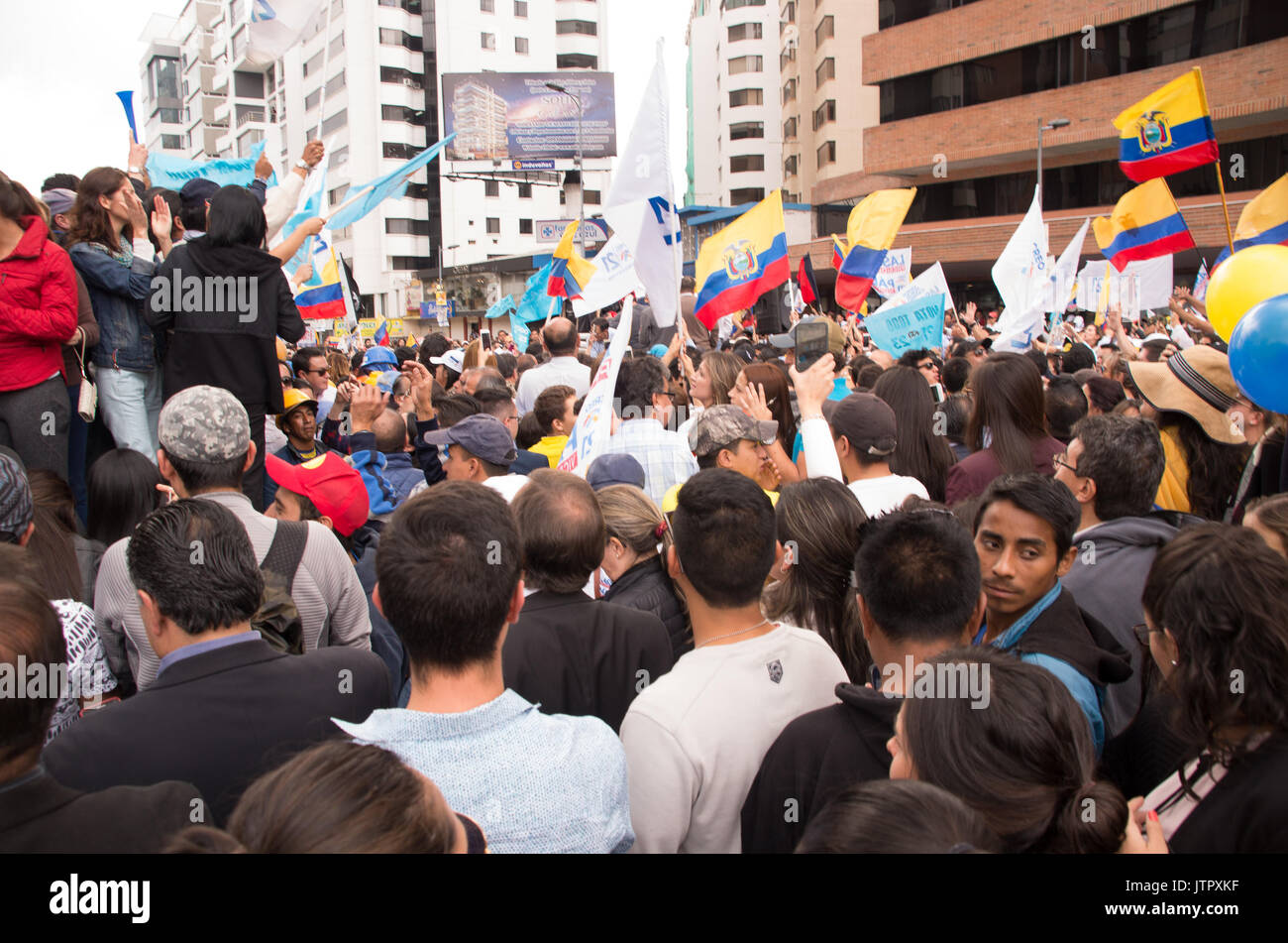 Quito, Ecuador - April 7, 2016: Crowd of people with ecuadorian and ...