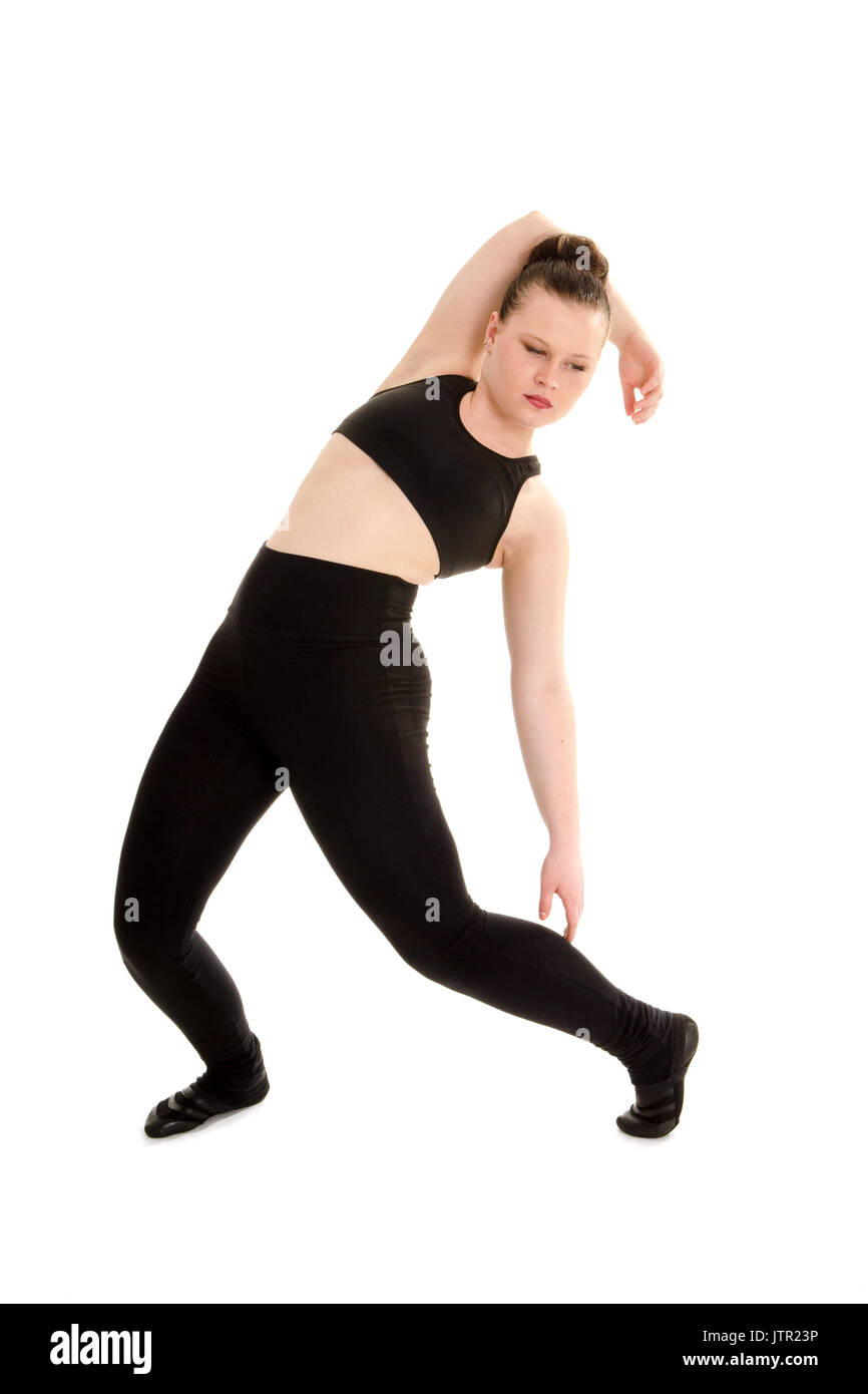 Female Contemporary or Modern Teen Dancer captured in stylized routine ...