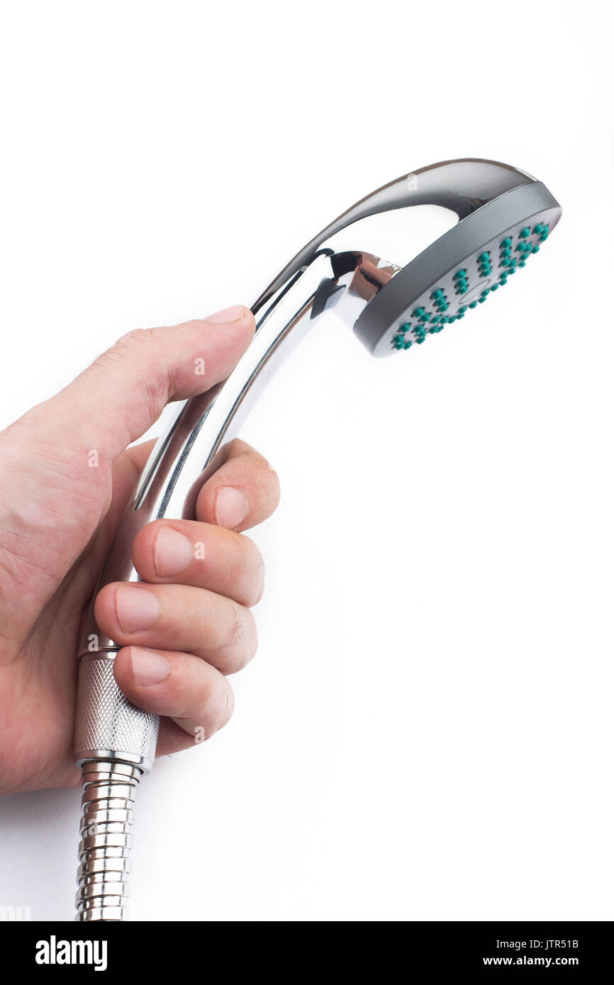 side view of Caucasian hand holding chrome shower head isolated on ...