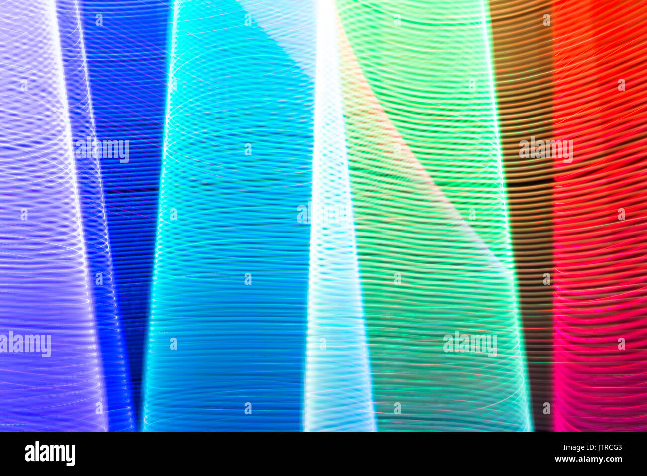 Bright glow light tracks against dark surrounding area Stock Photo - Alamy